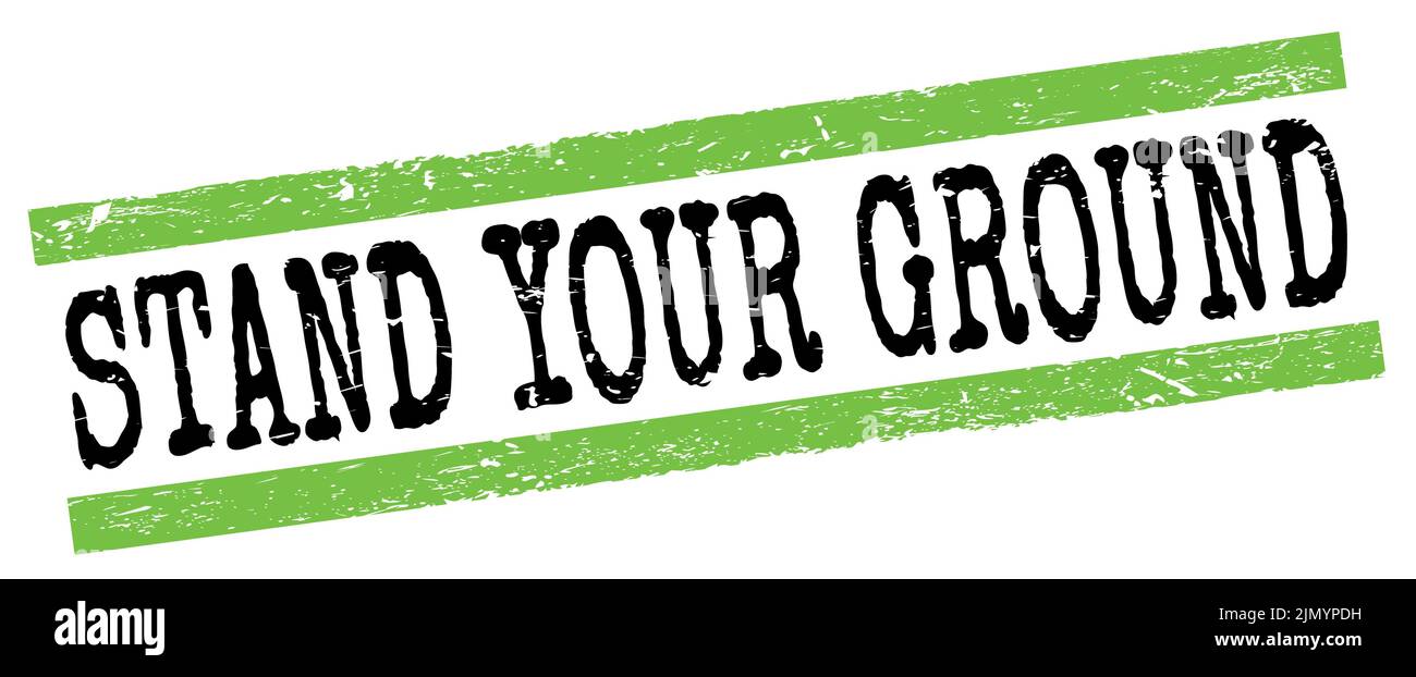 STAND YOUR GROUND text written on green-black grungy lines stamp sign ...