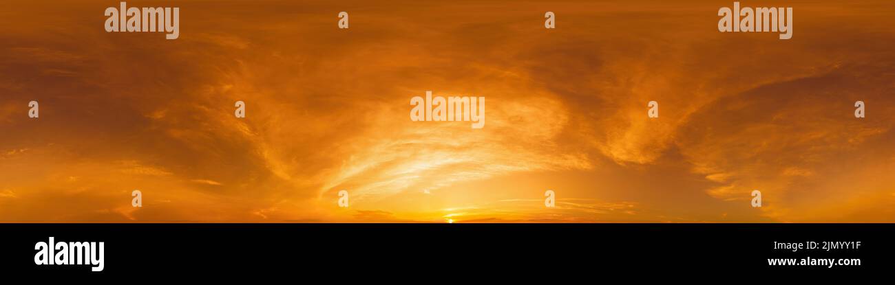 Golden glowing sunset sky panorama with Cirrus clouds. Hdr seamless ...