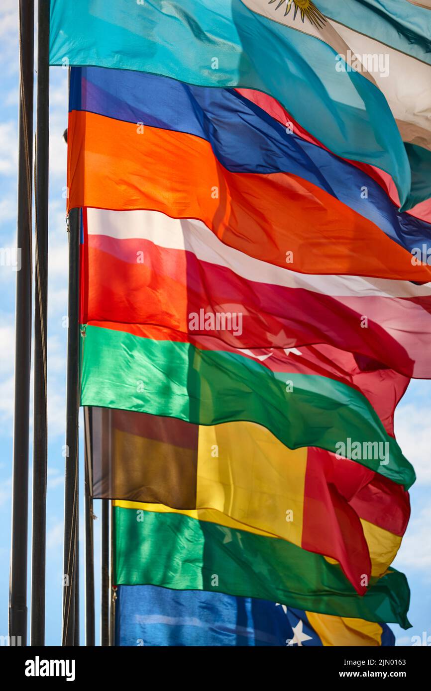 Flags of the word waving in the wind. Nation emblems Stock Photo - Alamy
