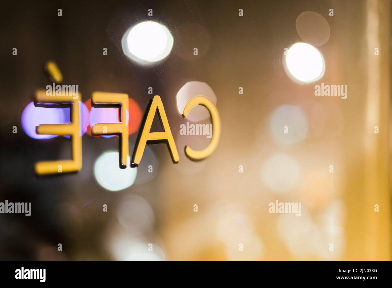 Cafe window in the city at night Stock Photo - Alamy