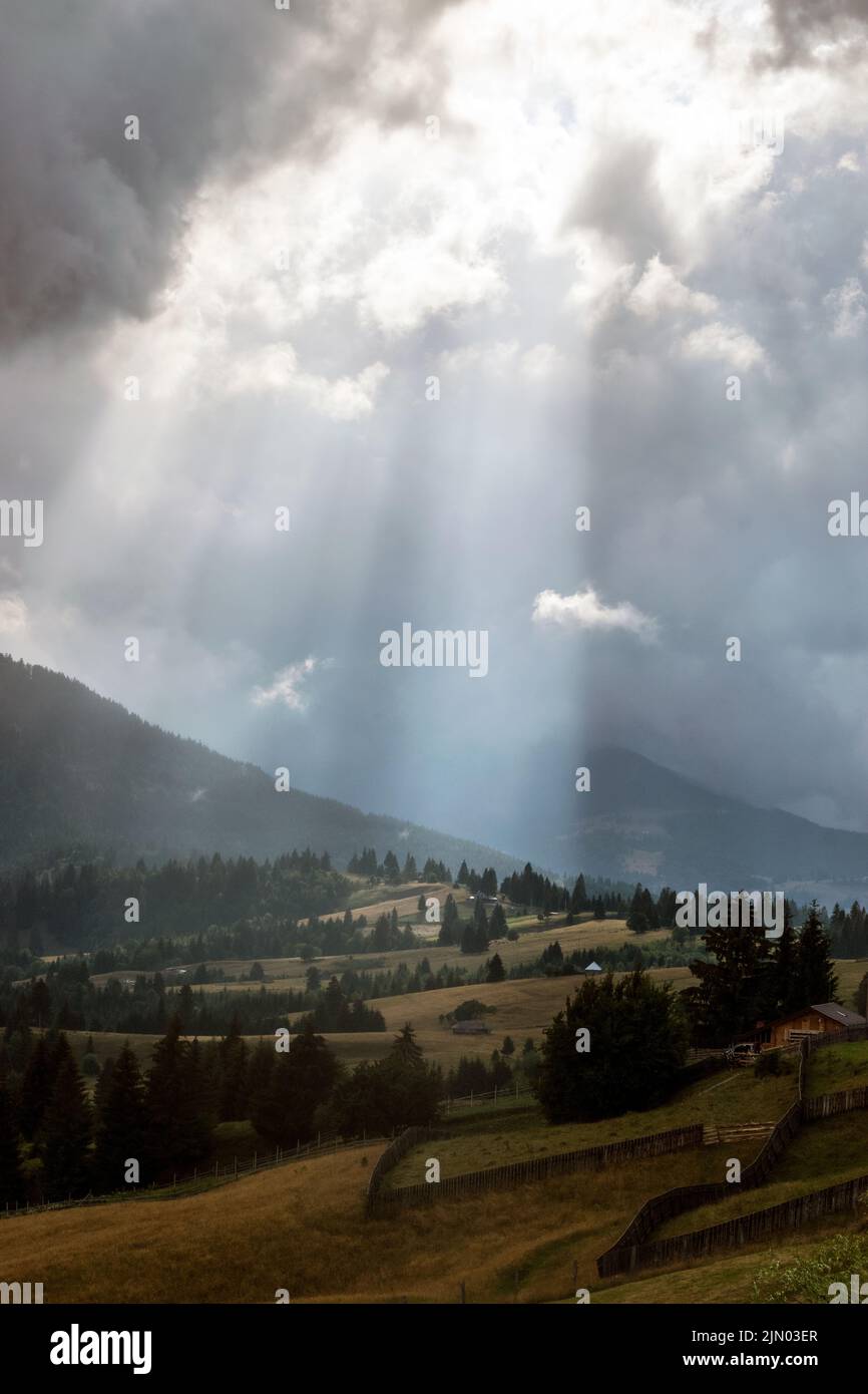 Sun rays through the clouds Stock Photo - Alamy