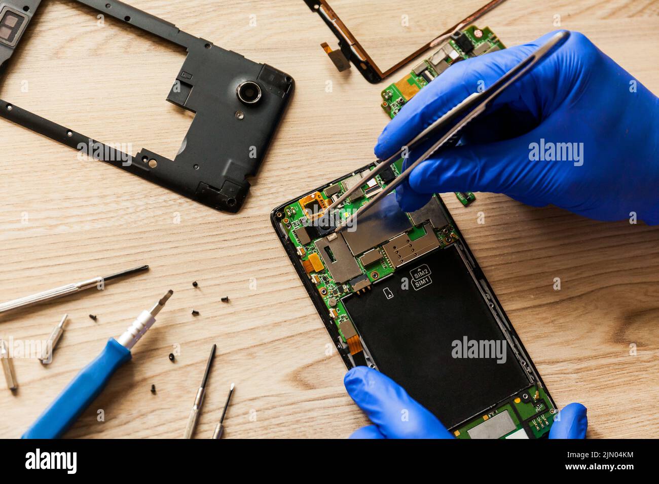 Mobile repairing in lab hi-res stock photography and images - Alamy