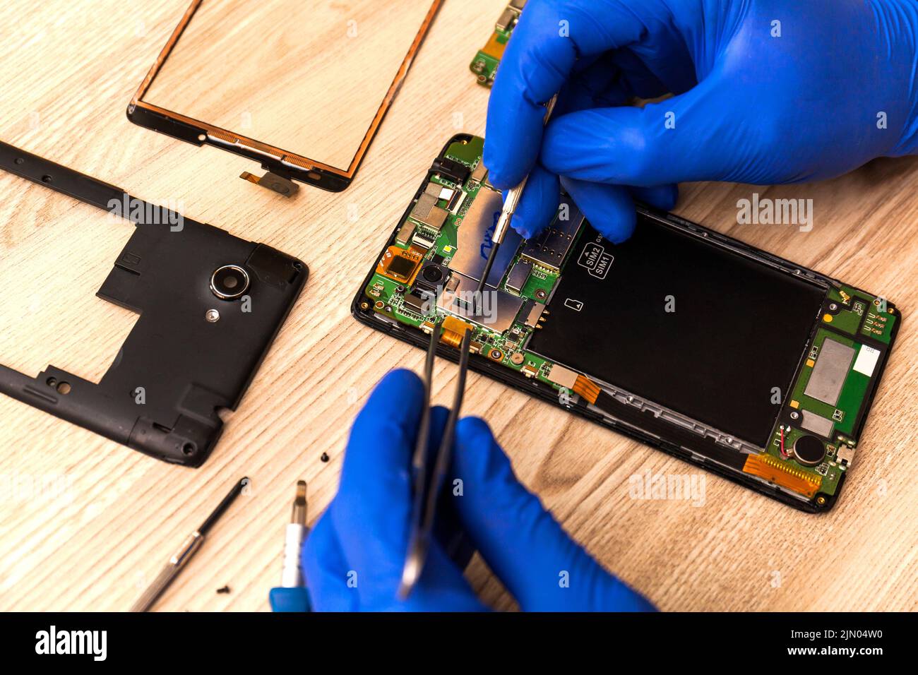 Mobile repairing in lab hi-res stock photography and images - Alamy