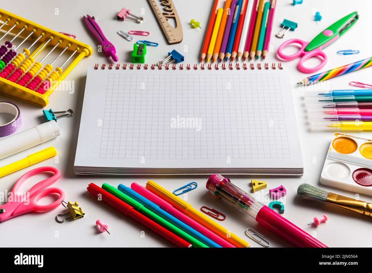 Blank notebook with School office supplies on a desk with copy space ...