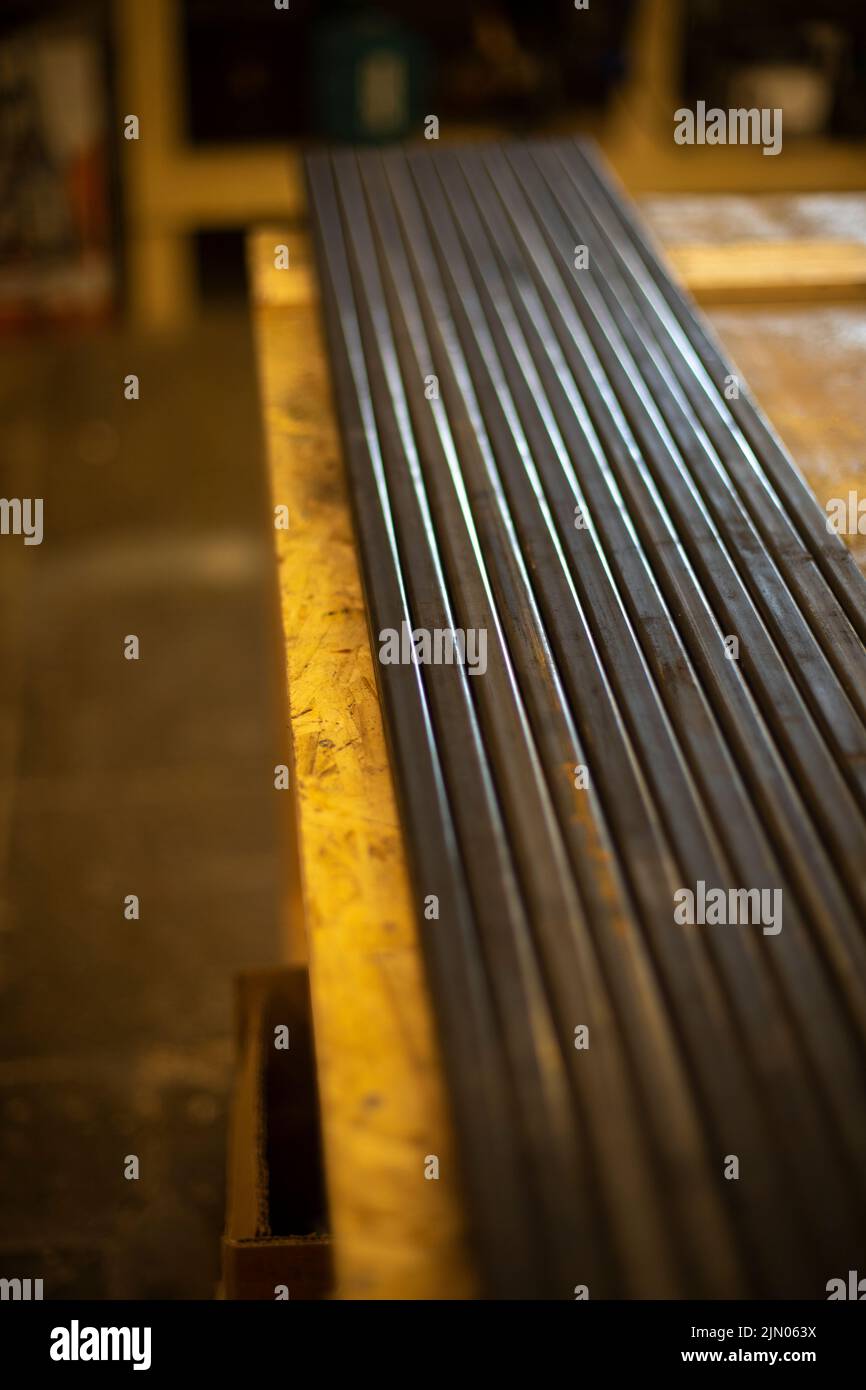 Steel profile. Metal parts. Iron rods. Steel slats Stock Photo - Alamy