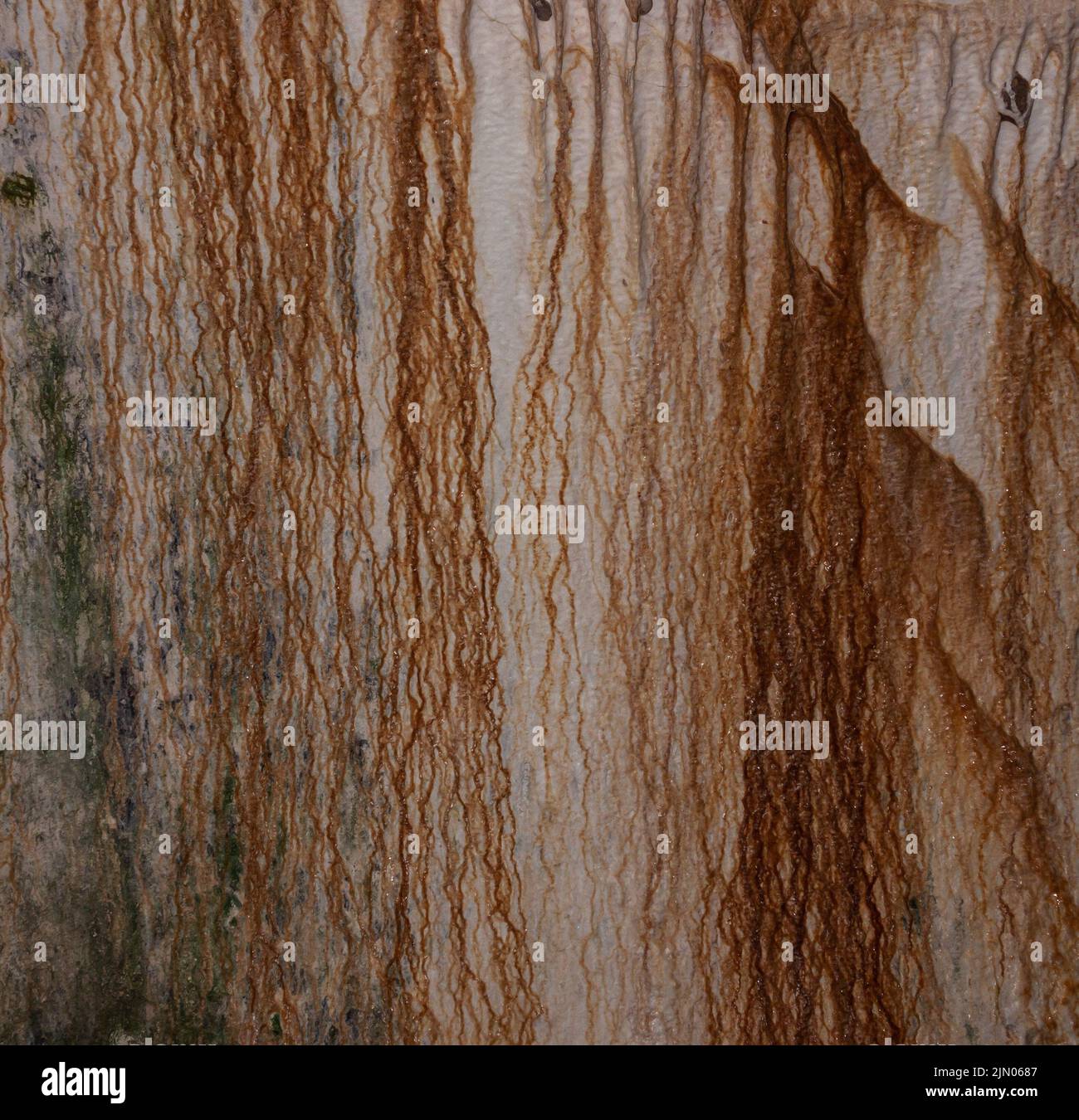 The rust stains on a concrete wall Stock Photo - Alamy