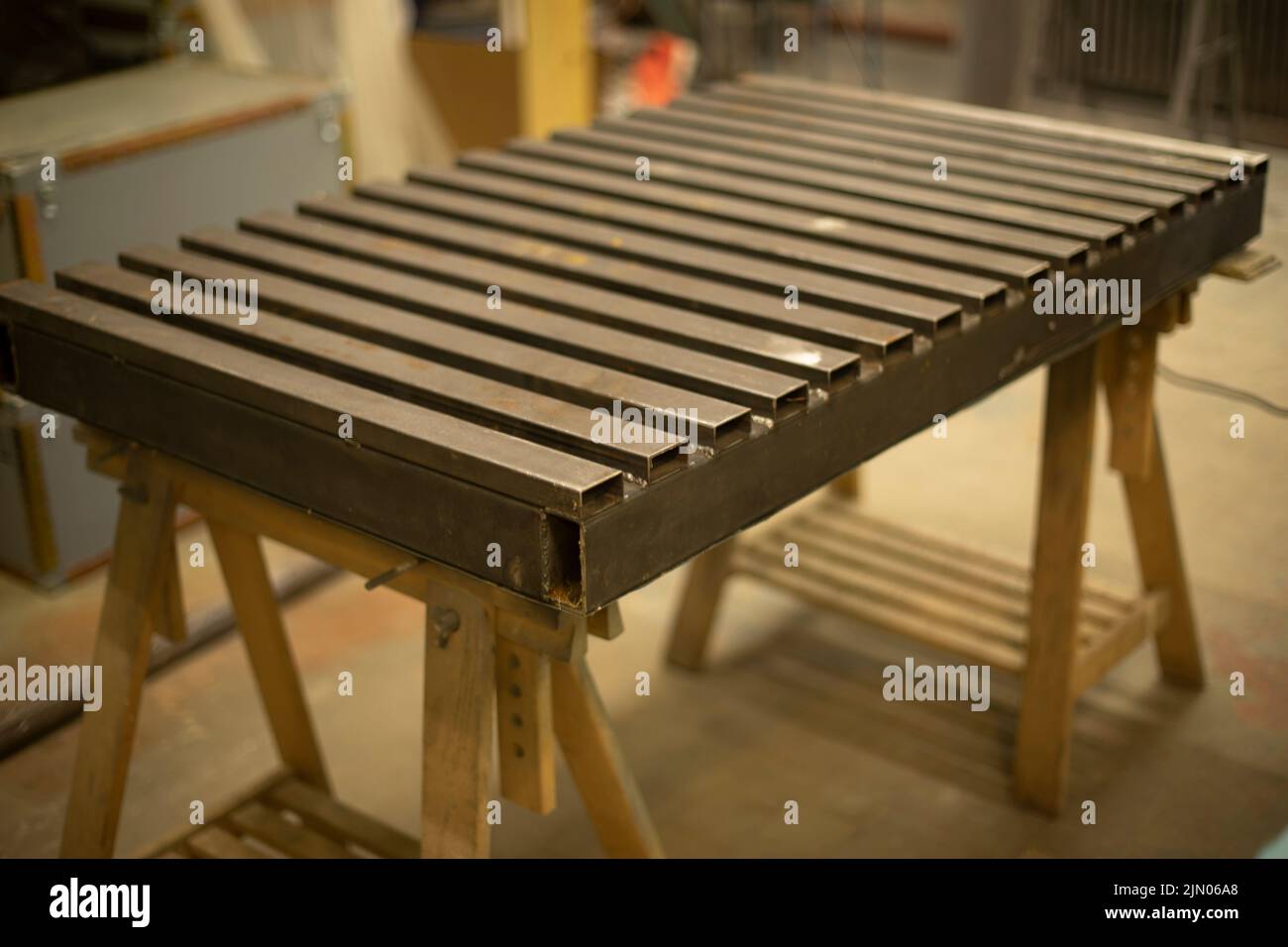 Steel table. Industrial processing. Details of work with structure ...