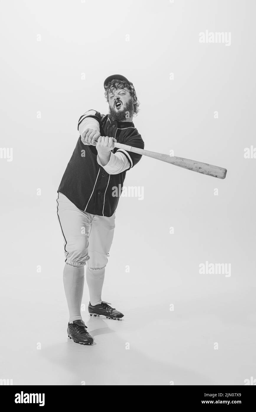 Monochrome portrait of male baseball player wearing retro sports ...