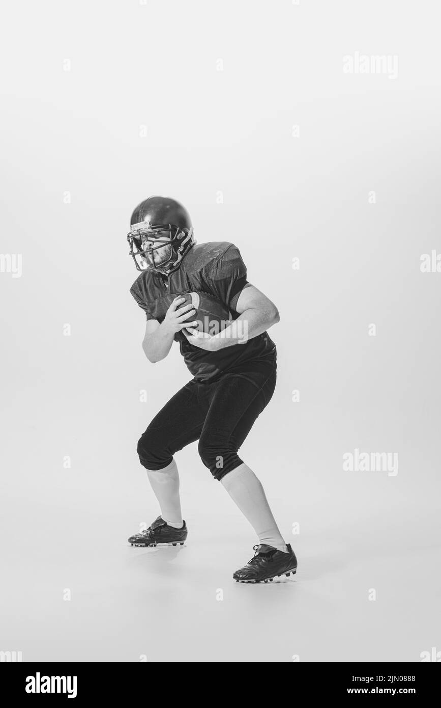Black and white portrait of american football player in vintage style ...