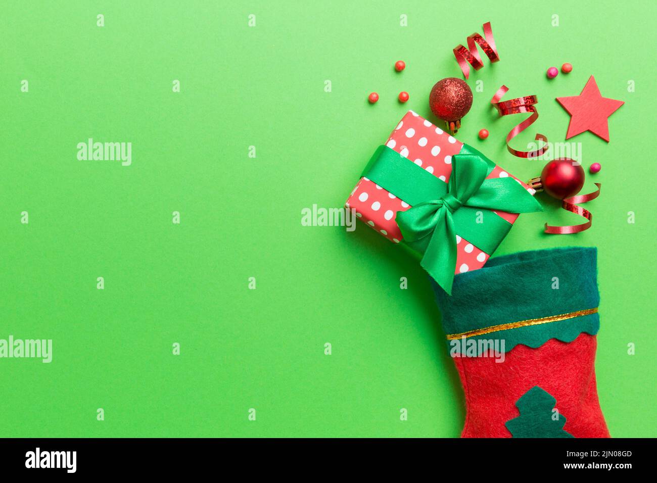 santa red sock top view on the color background with empty space ...