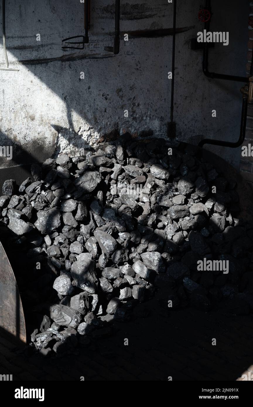 Old-fashioned, non-environmental heating fuel, black rock coal for use ...