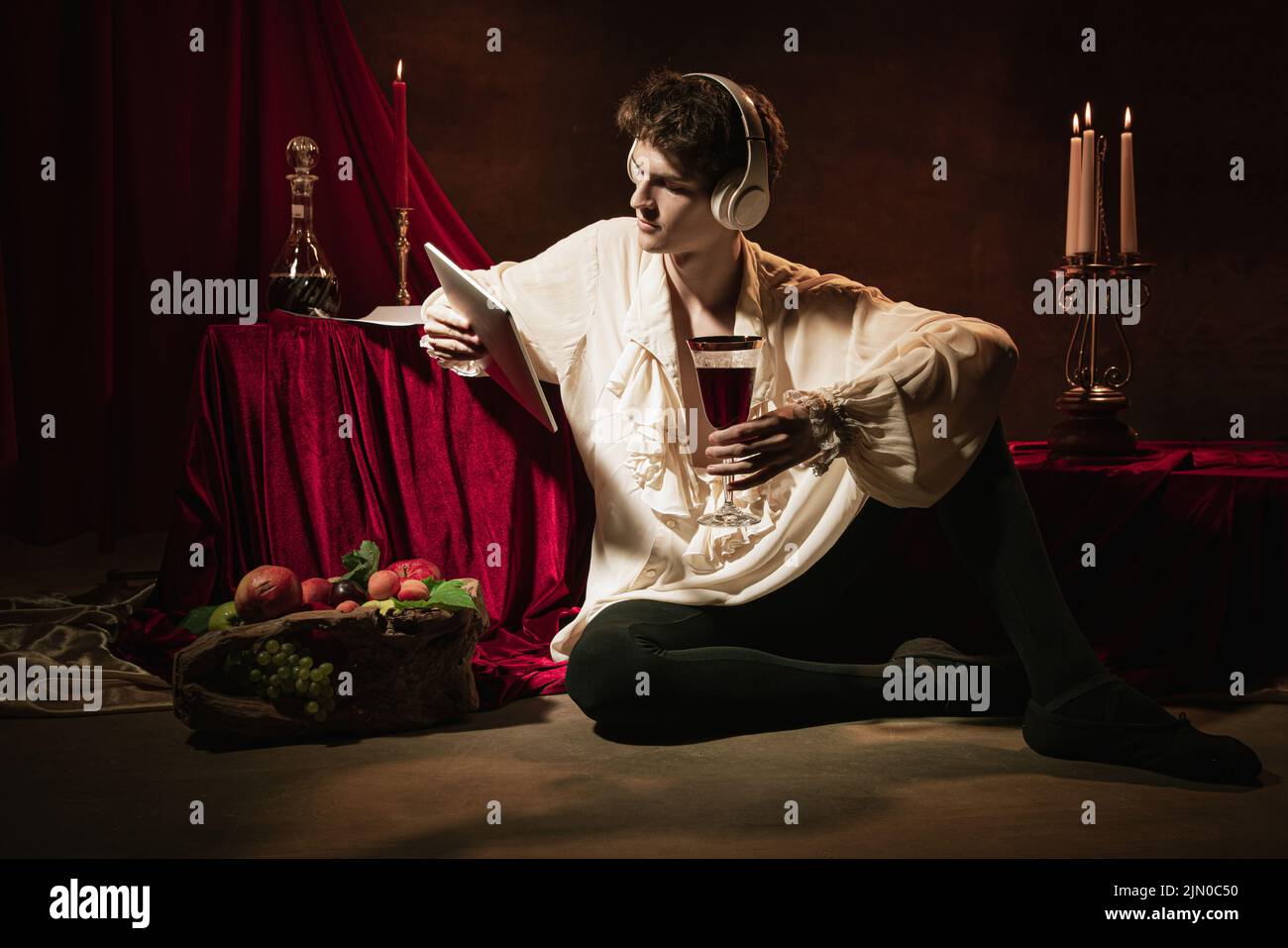 Creative portrait of young handsome man in image of famous historical ...