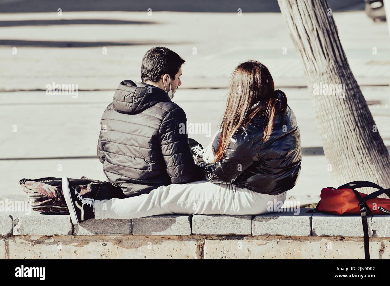 Couple in love hugging on a beach in Spain Stock Photo - Alamy