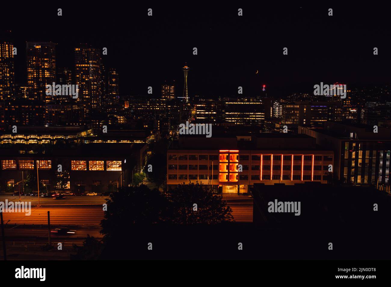Seattle city skyline from Capitol Hill at night with crescent moon ...