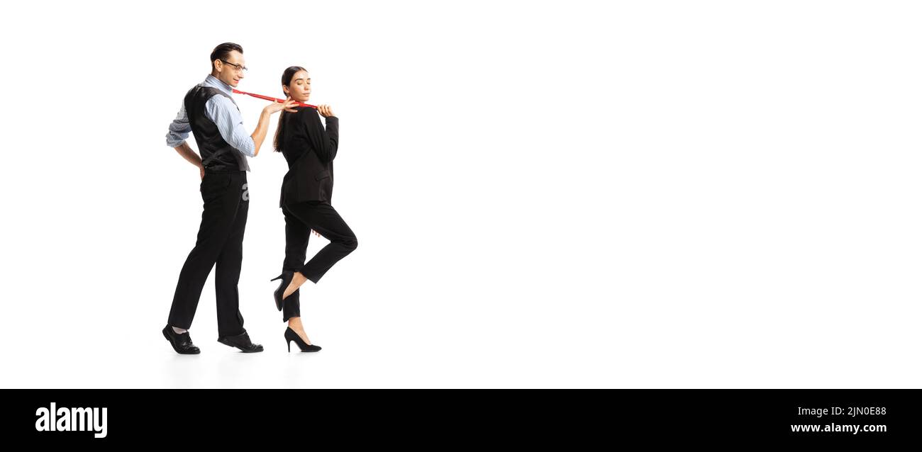 Man following woman Cut Out Stock Images & Pictures - Alamy