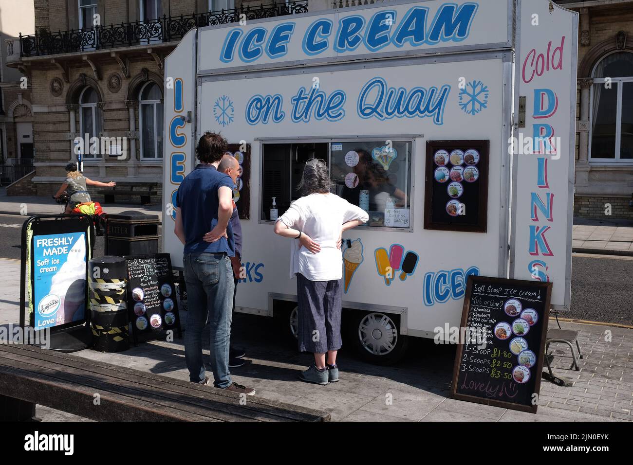 Queuing for ice cream at Harwich Essex UK Stock Photo - Alamy