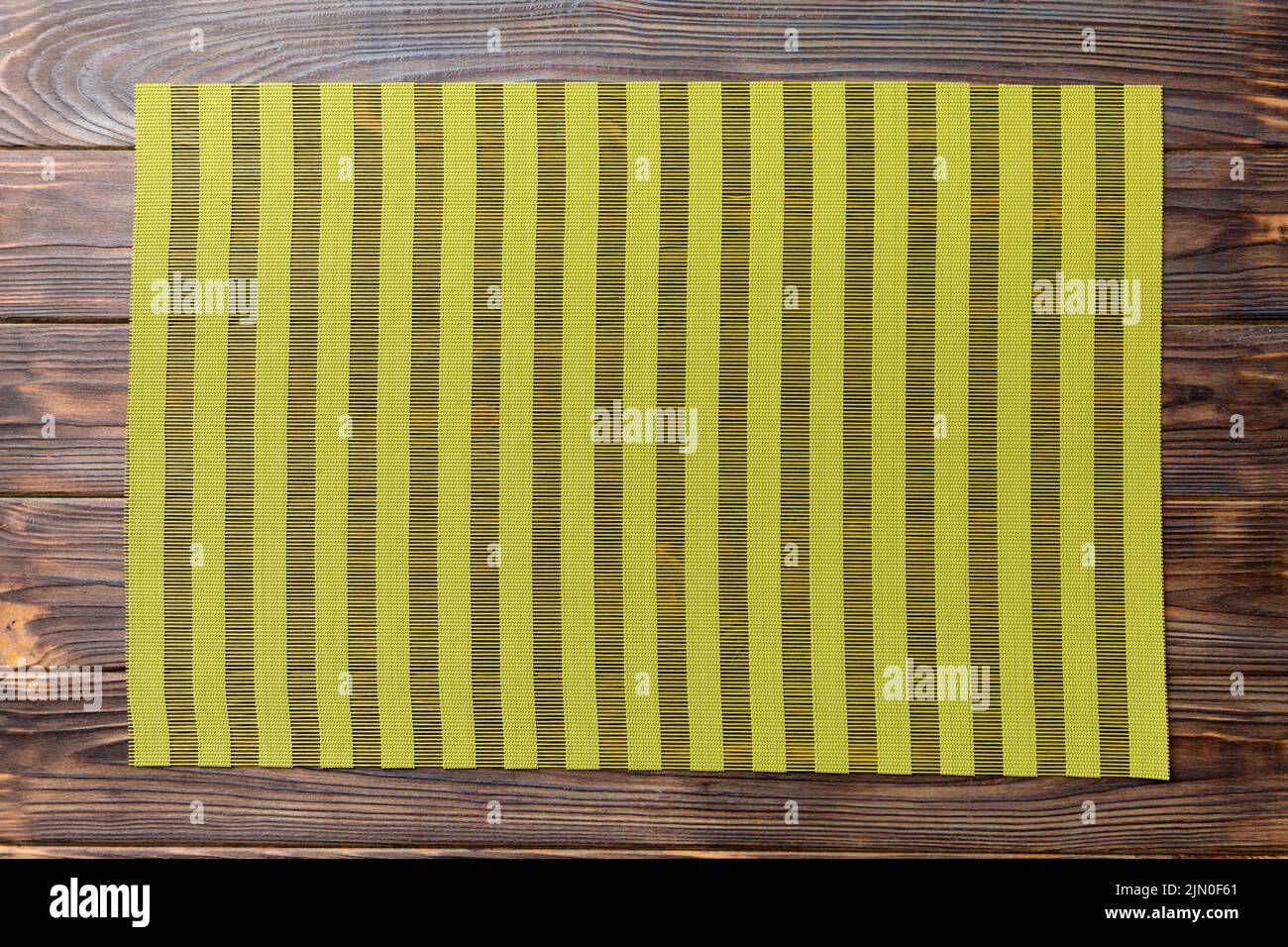 Top view of green tablecloth for food on wooden background. Empty space ...