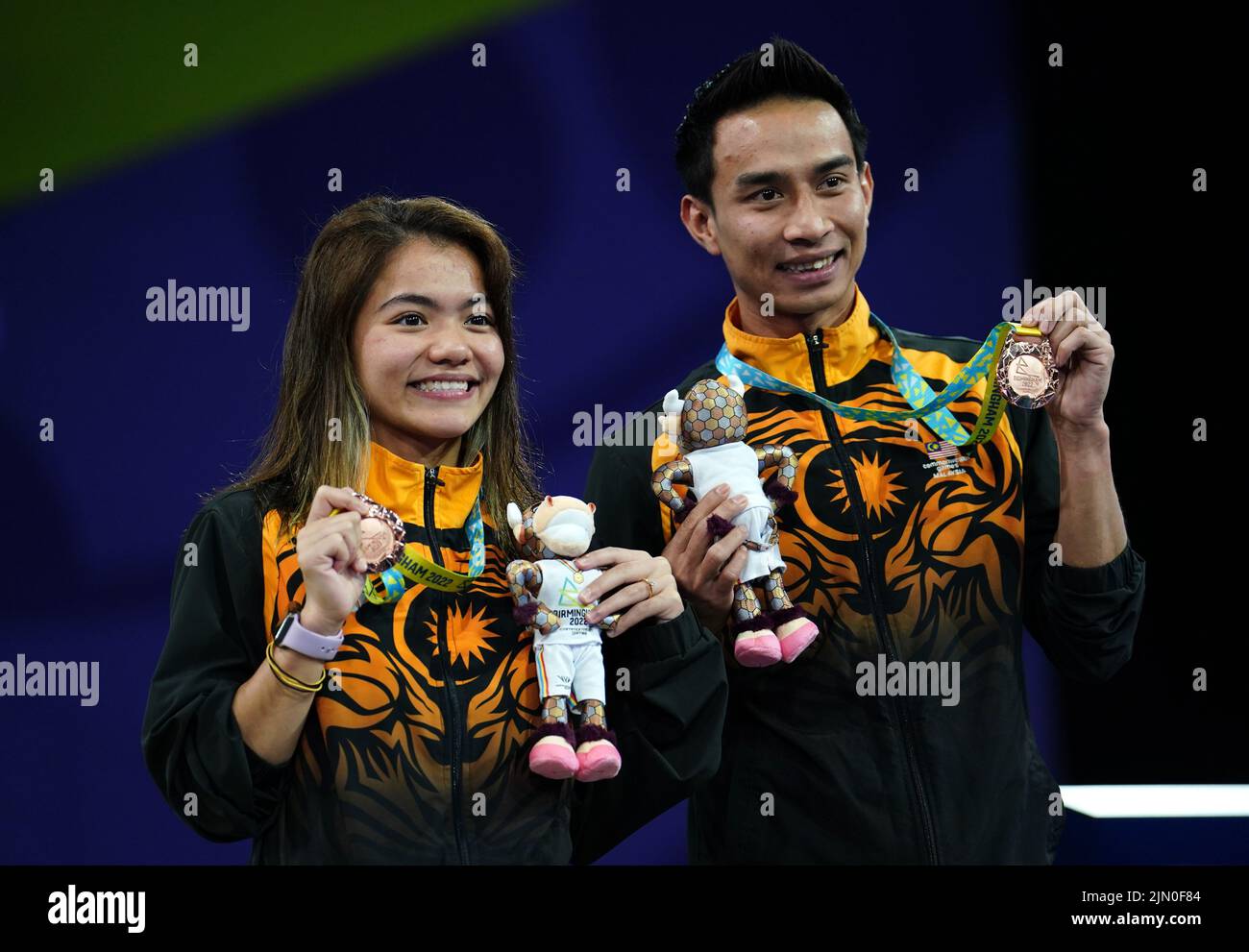 Malaysia's Muhammad Bin Puteh and Nur Sabri (right) with their Bronze ...