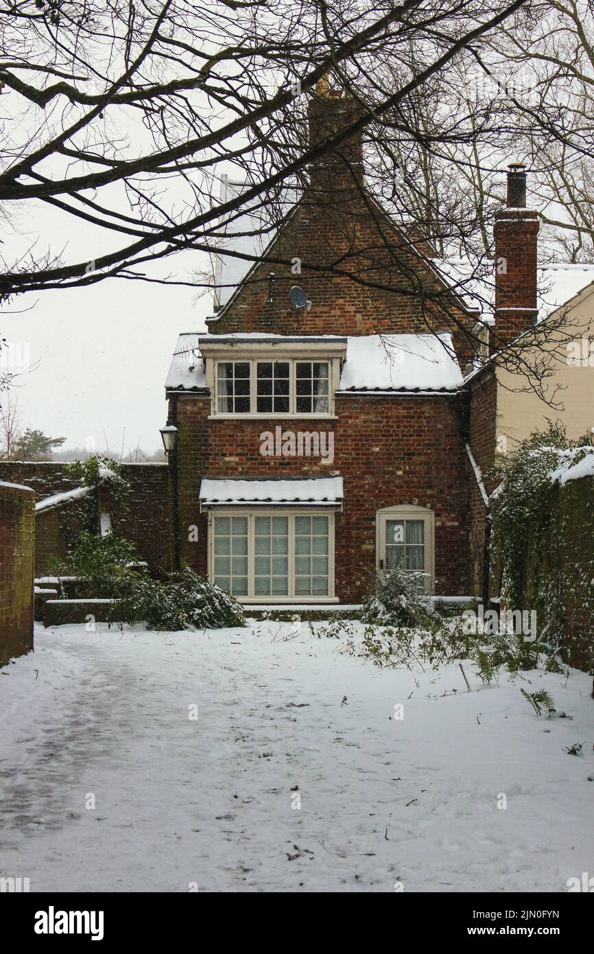 Brick house covered with snow in Norwich during winter Stock Photo - Alamy