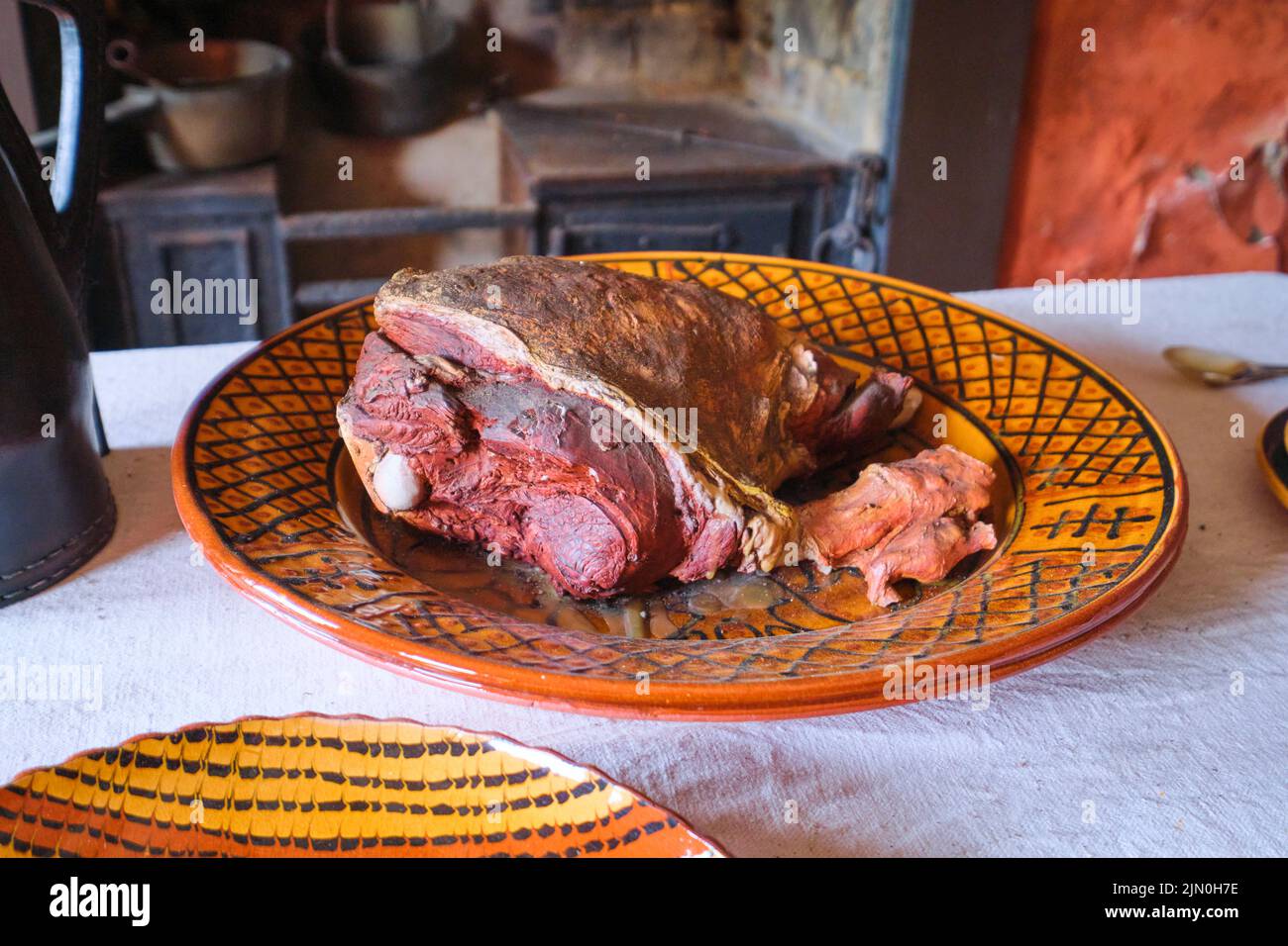 Detail of a typical meal, a fake roast done in plastic. In a recreation ...