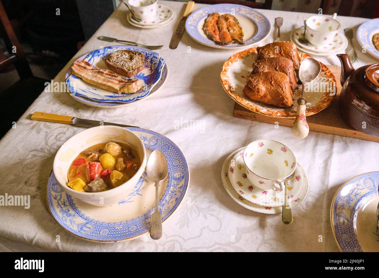 A typical meal, tea and fake food. Stew, cornish hens, bacon, bread ...