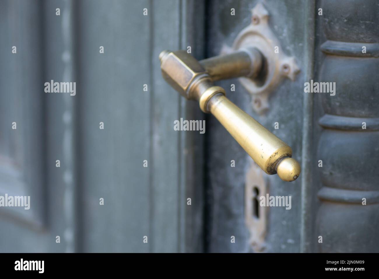 Metal decorative handles. Metal decorative handle on old massive ...