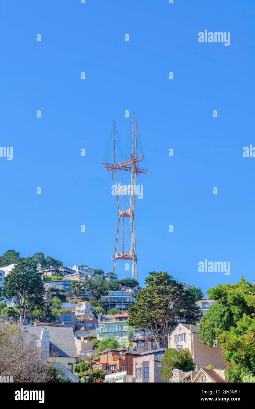 San Francisco, California- Sutro Tower above the houses on a slope ...