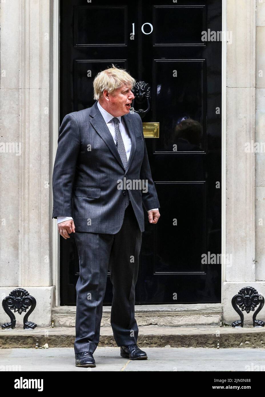 Prime minister boris johnson stands outside 10 downing street hi-res ...