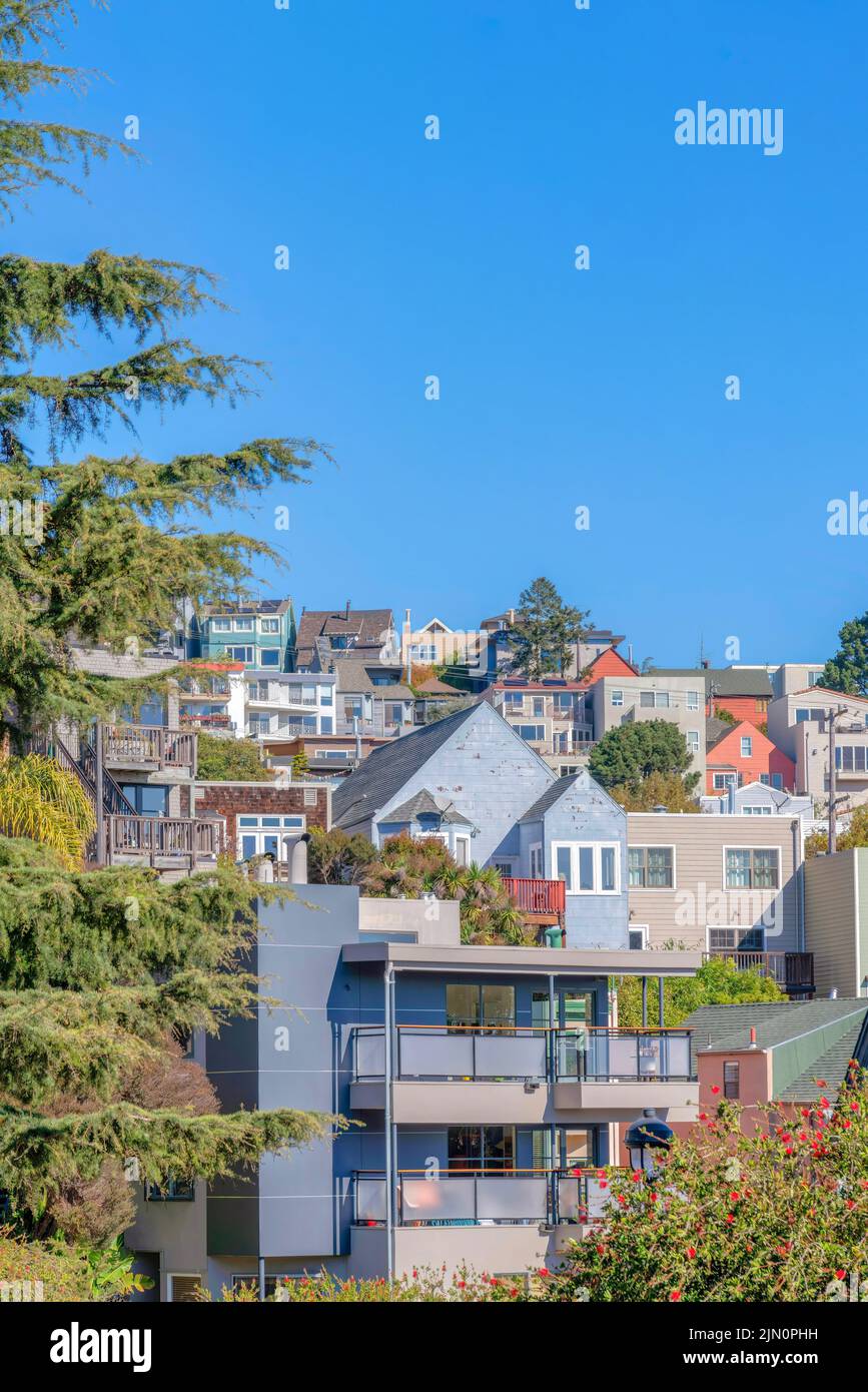 Sloped residential buildings in San Francisco, California. There is a ...