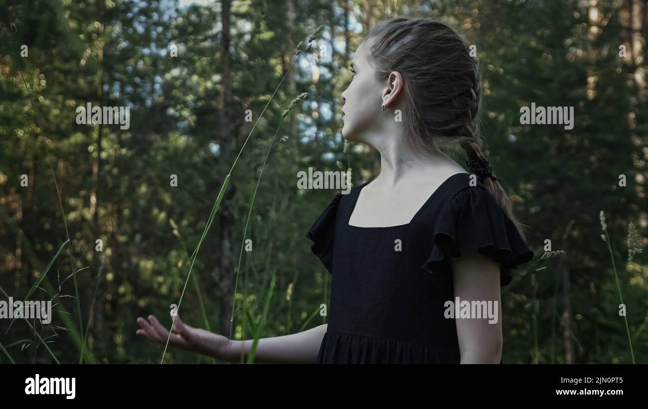 Schoolgirl lost in dark forest and screams crying closeup Stock Photo ...