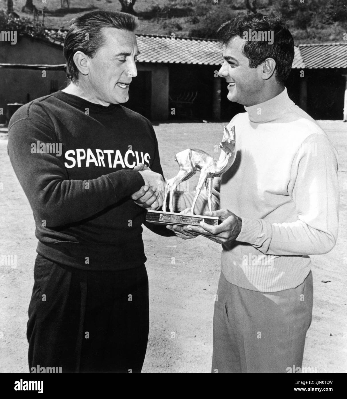 KIRK DOUGLAS presents co-star TONY CURTIS with his Bambi Award as Best ...