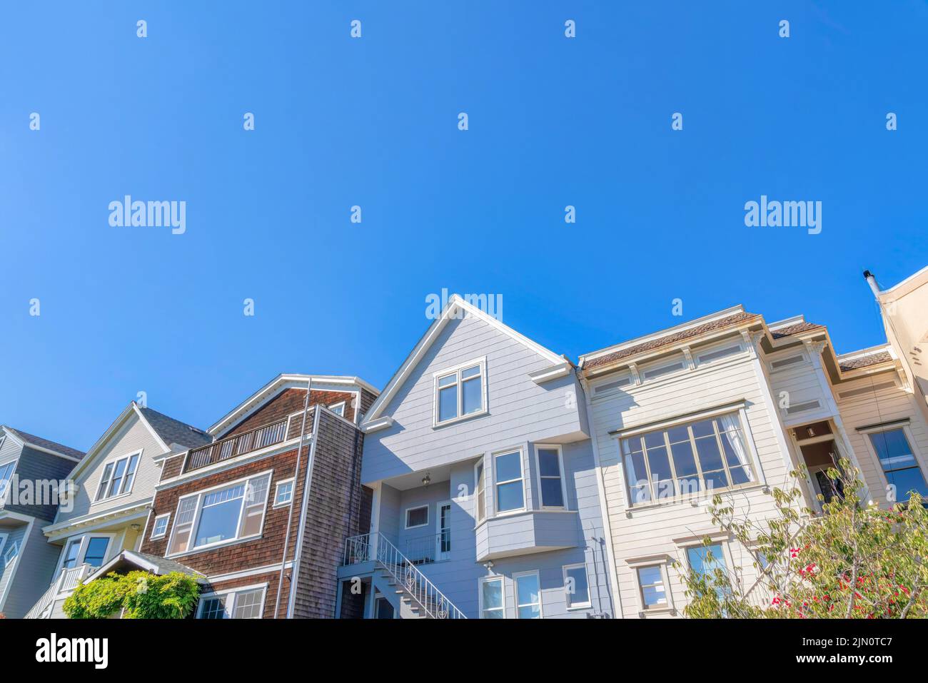 Facade of rowhouses in San Francisco, California against the sky ...