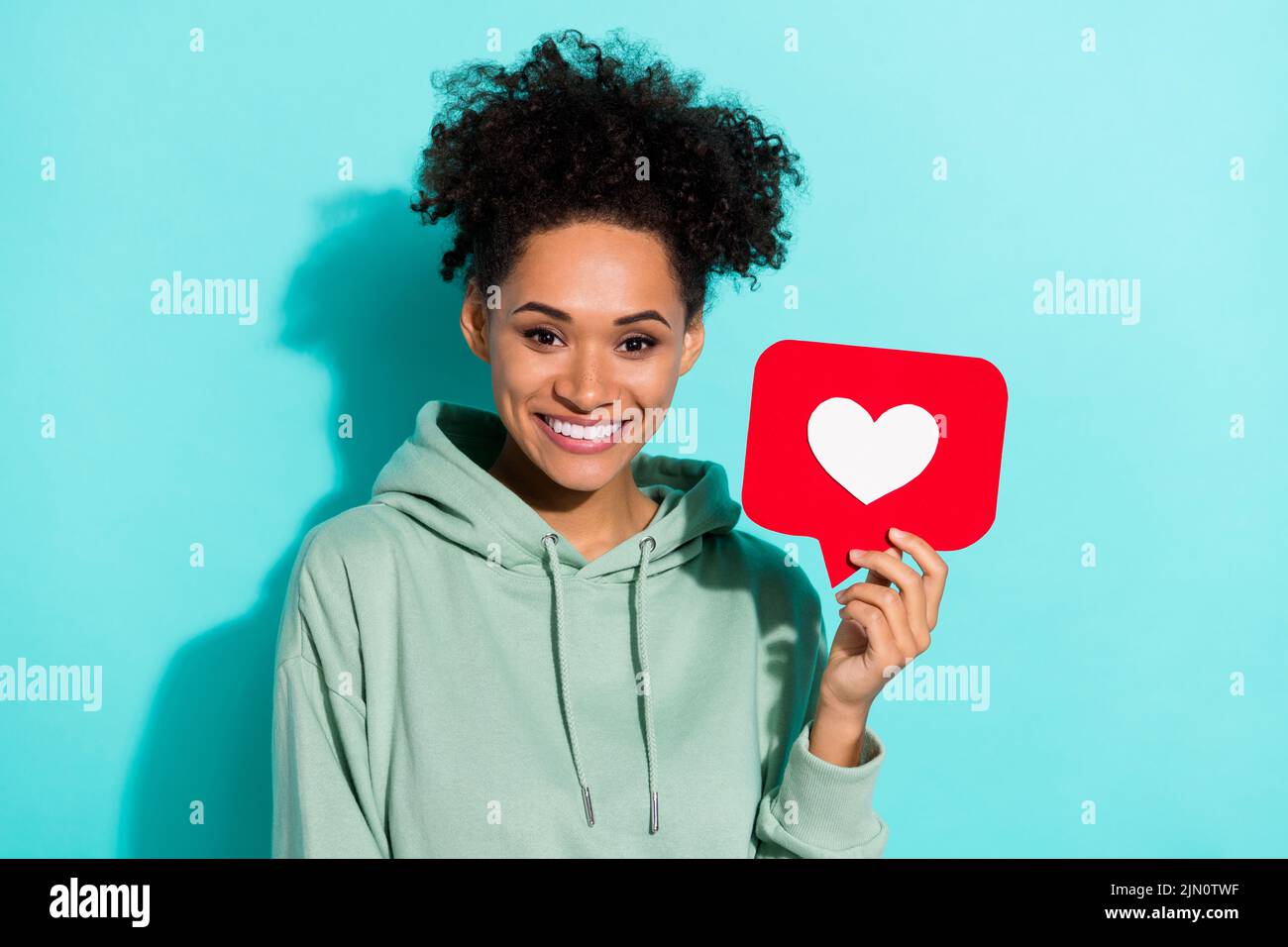 Portrait of adorable positive girl toothy smile arm hold paper like ...