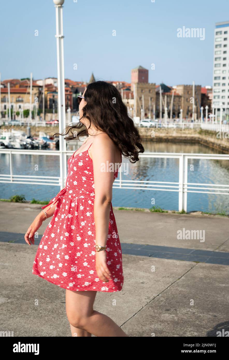 Young woman spinning around on hi-res stock photography and images - Alamy