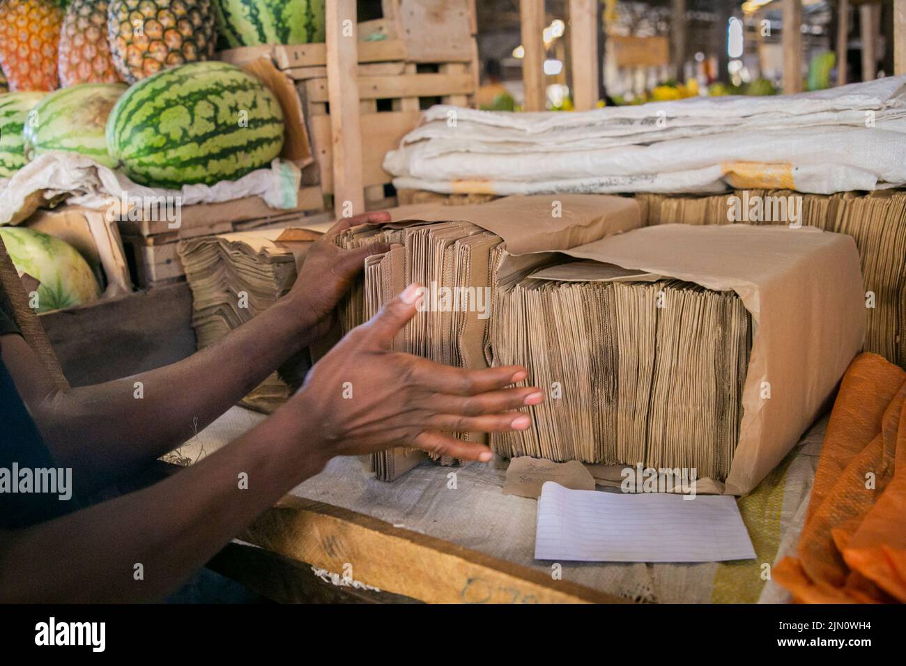 Kigali, Rwanda. 14th July, 2022. A vendor arranges paper bags at ...