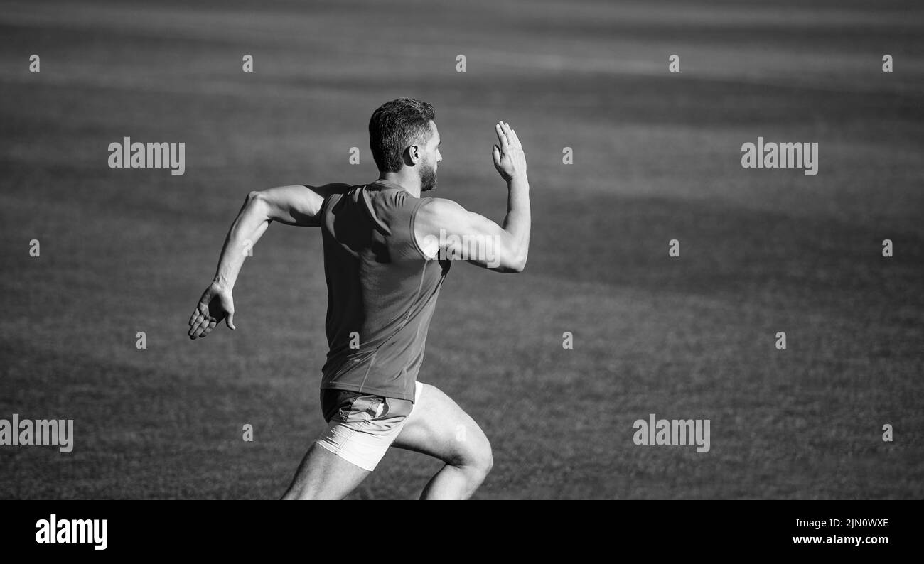 male sprinter running from start to finish with success and speed ...