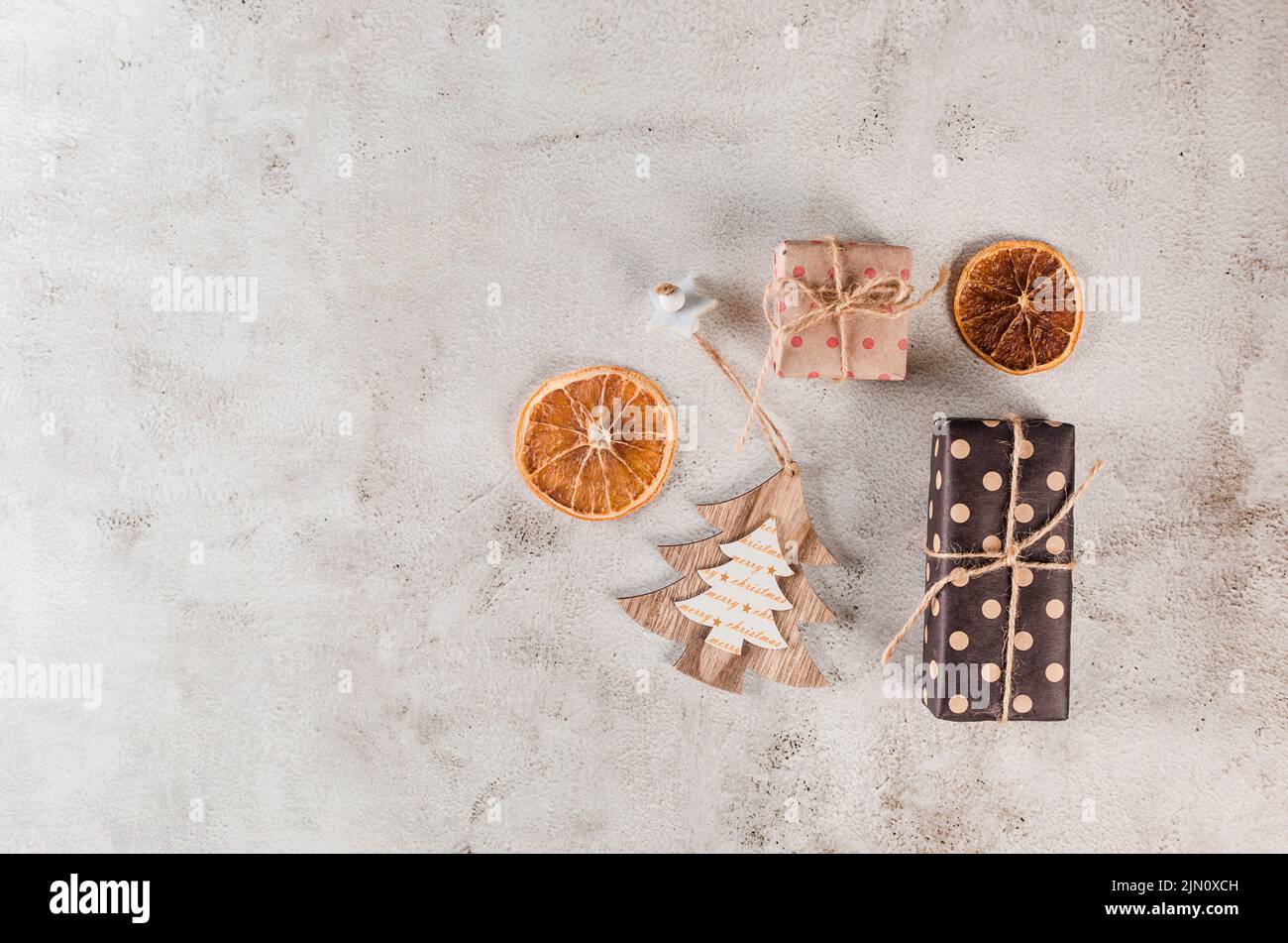 Christmas wrapped presents in kraft paper with different organic ...