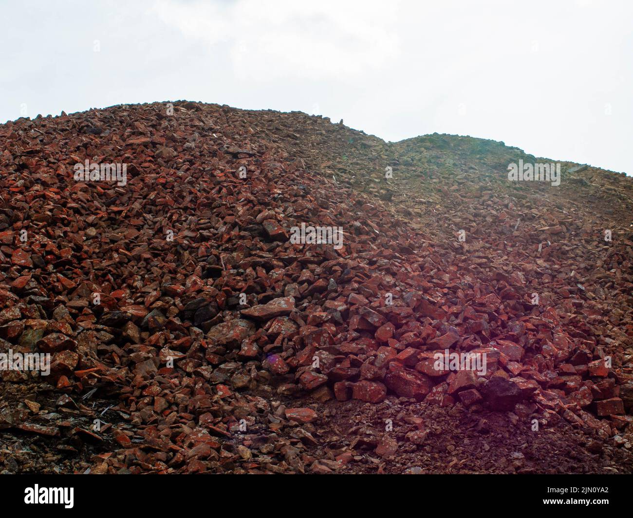 Enormous mountain of red copper mine slag stones and rocks from Falu ...