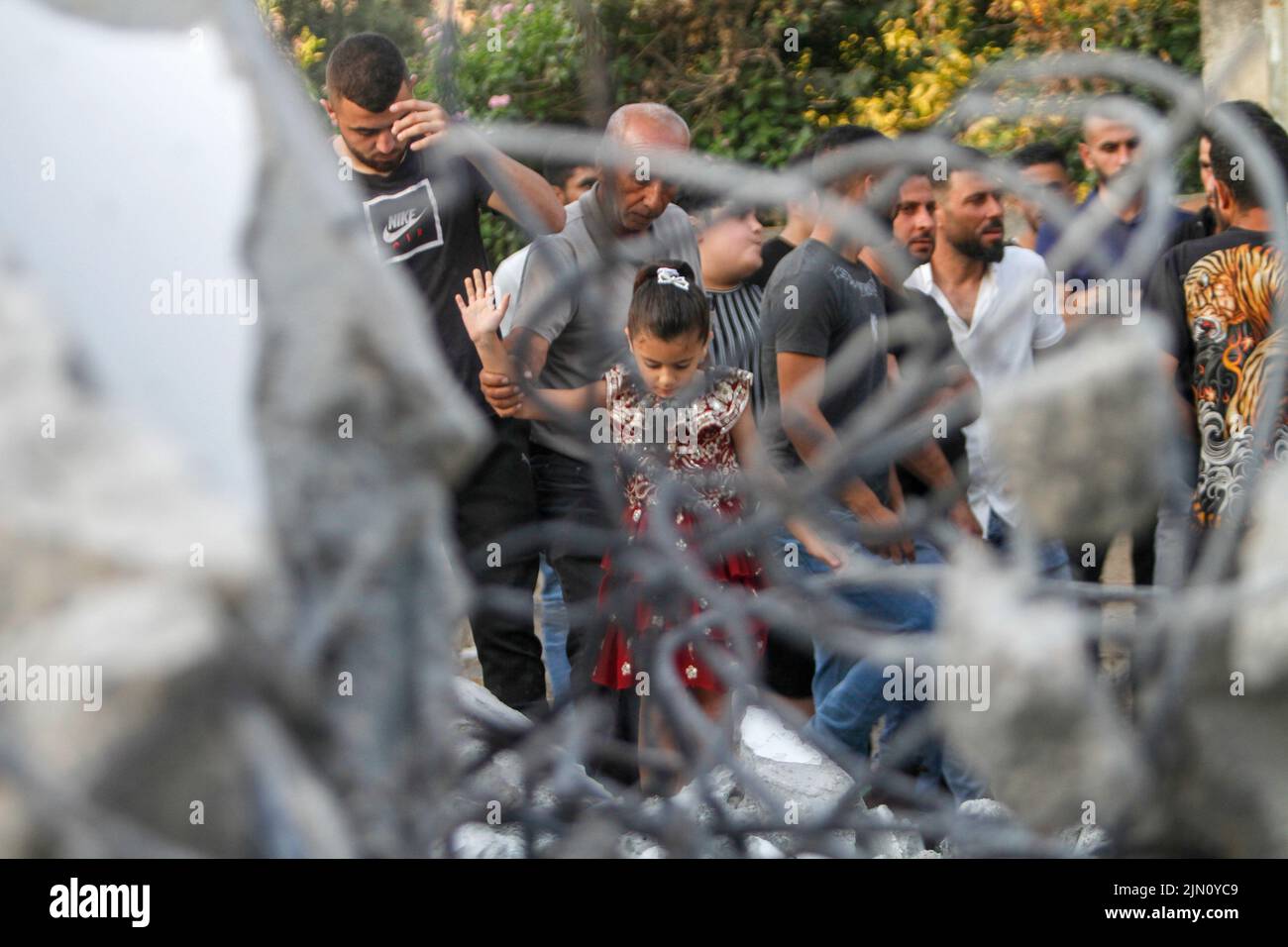 Jenin, Palestine. 02nd Aug, 2022. Palestinians inspect the house of ...