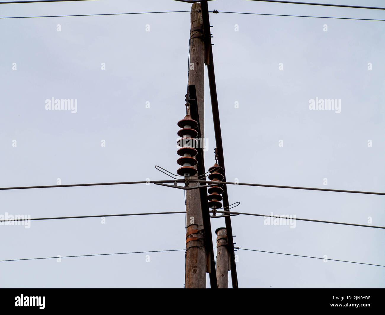Old rusty power lines on wodden structure with years of wear Stock ...
