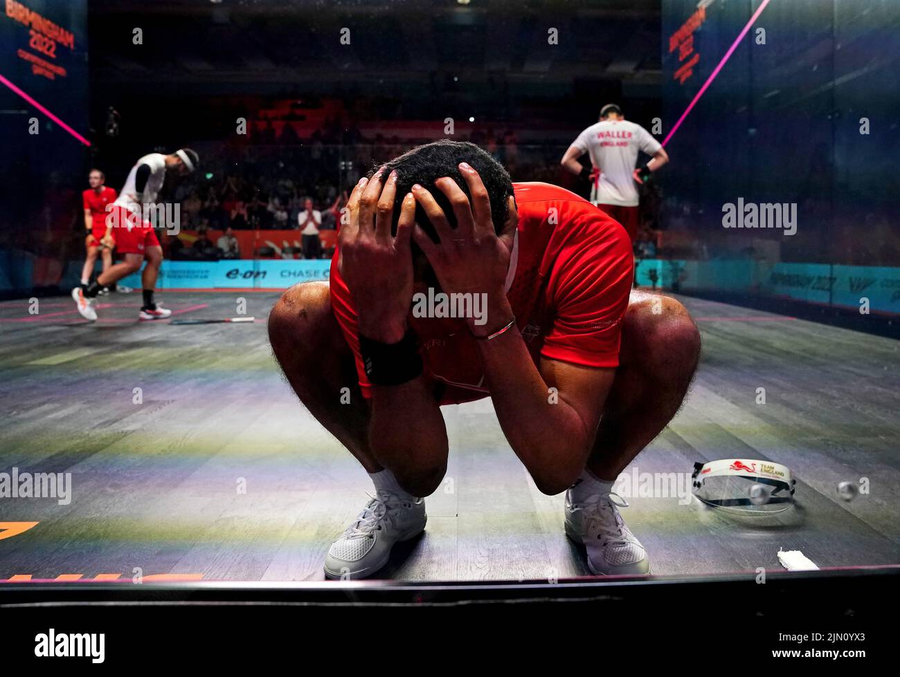 England's Declan James celebrates victory in the Men's Squash Doubles ...