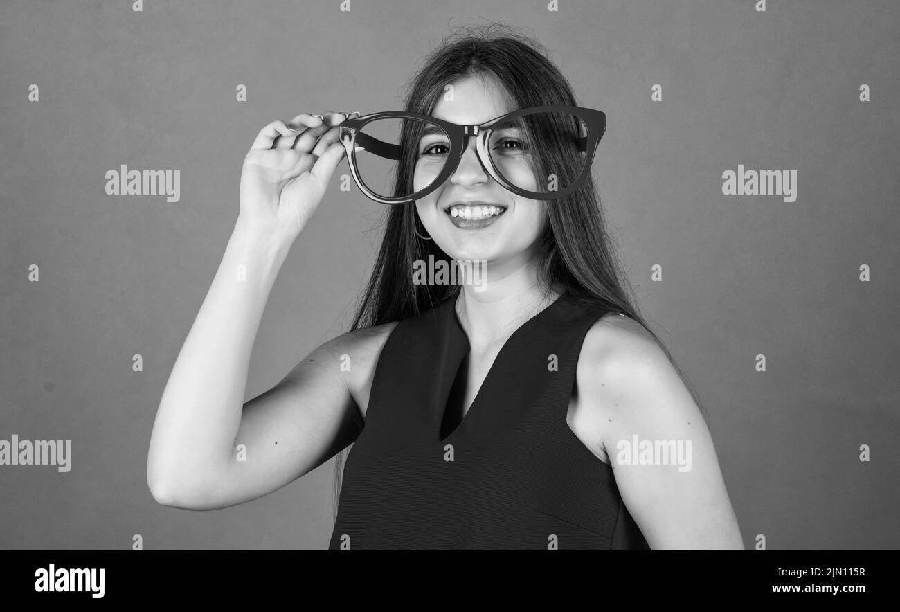 trendy looking kid girl with funny party glasses, having fun Stock ...