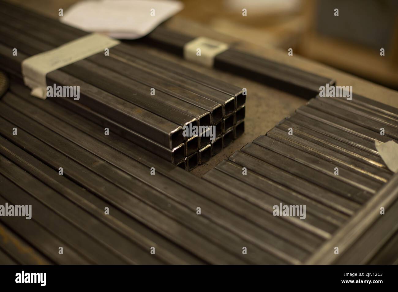 Steel profile in workshop. Rod made of metal. Steel part for ...