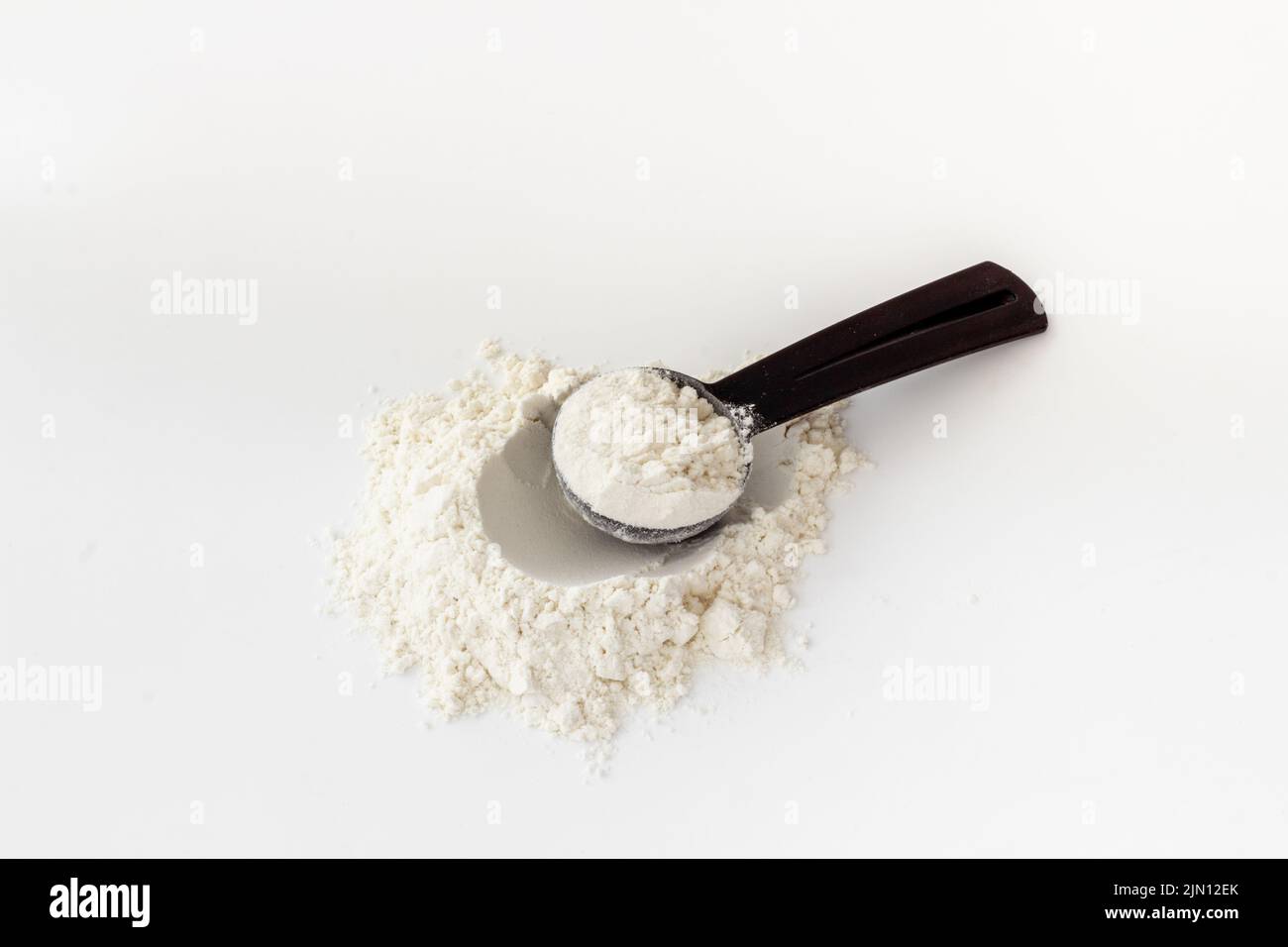 Whey protein powder on scoop. Fitness and gym diet nutrition Stock ...