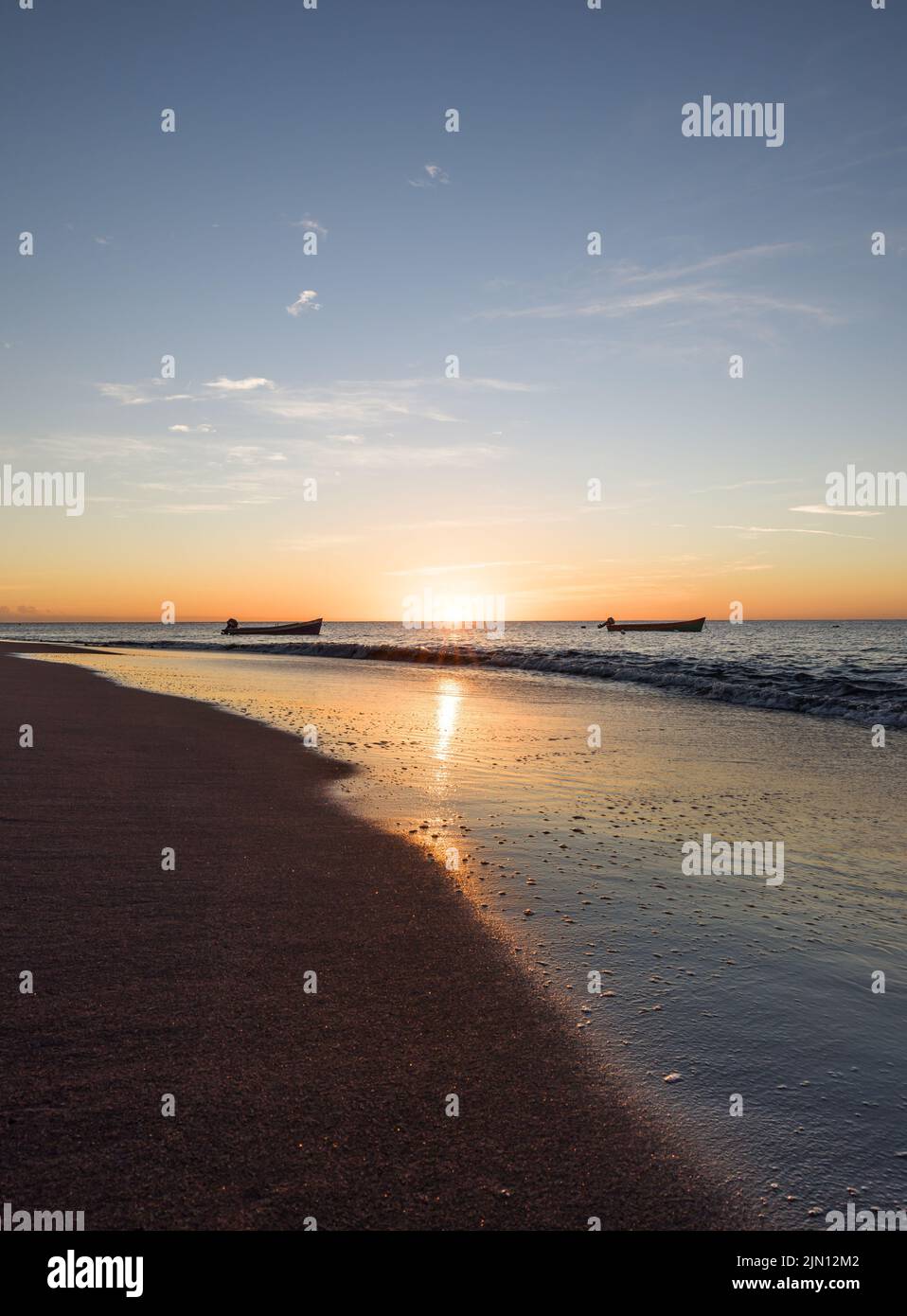 Sunset at le Precheur Beach, in Martinique, a small fishermen village ...