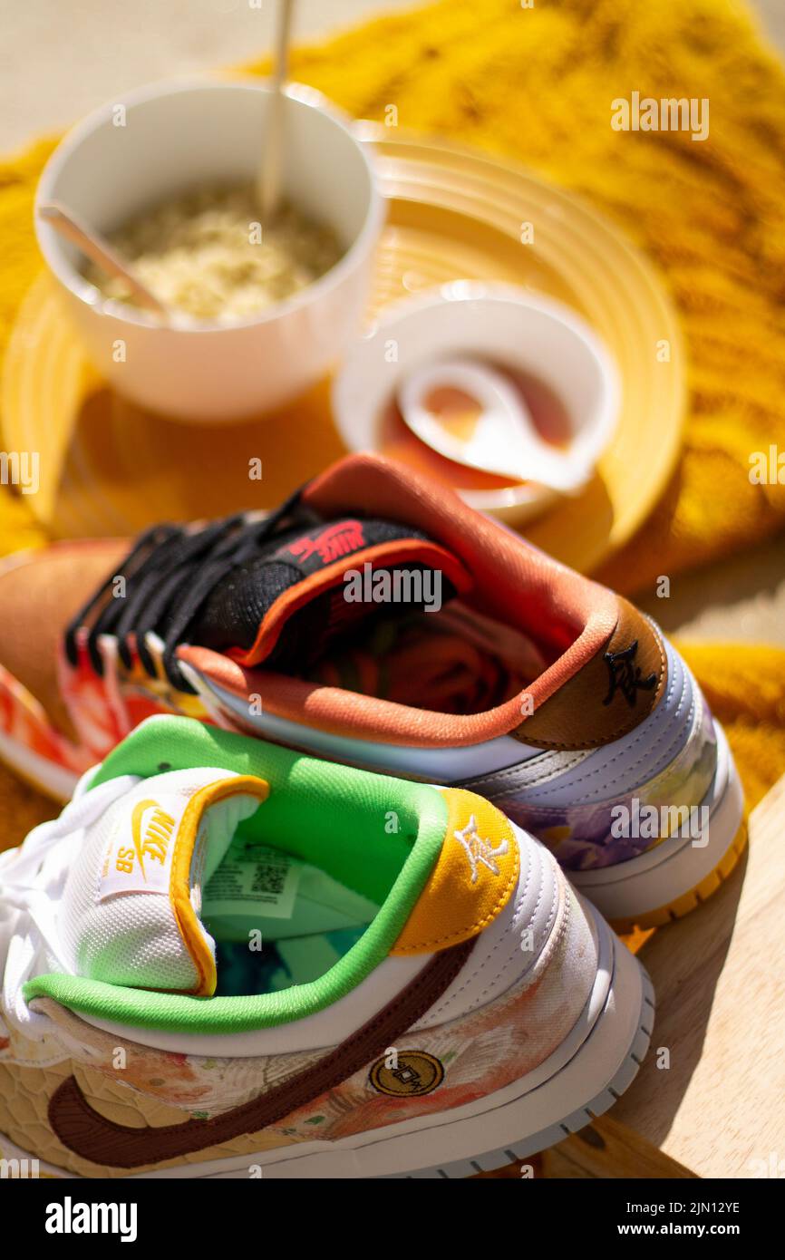 A close-up shot of sneakers with decorations: product display ...