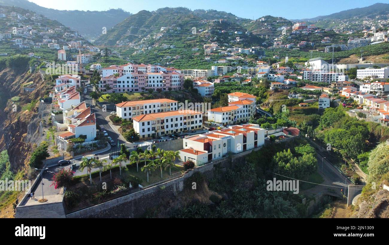 An aerial view of modern buildings surrounded by trees Stock Photo - Alamy
