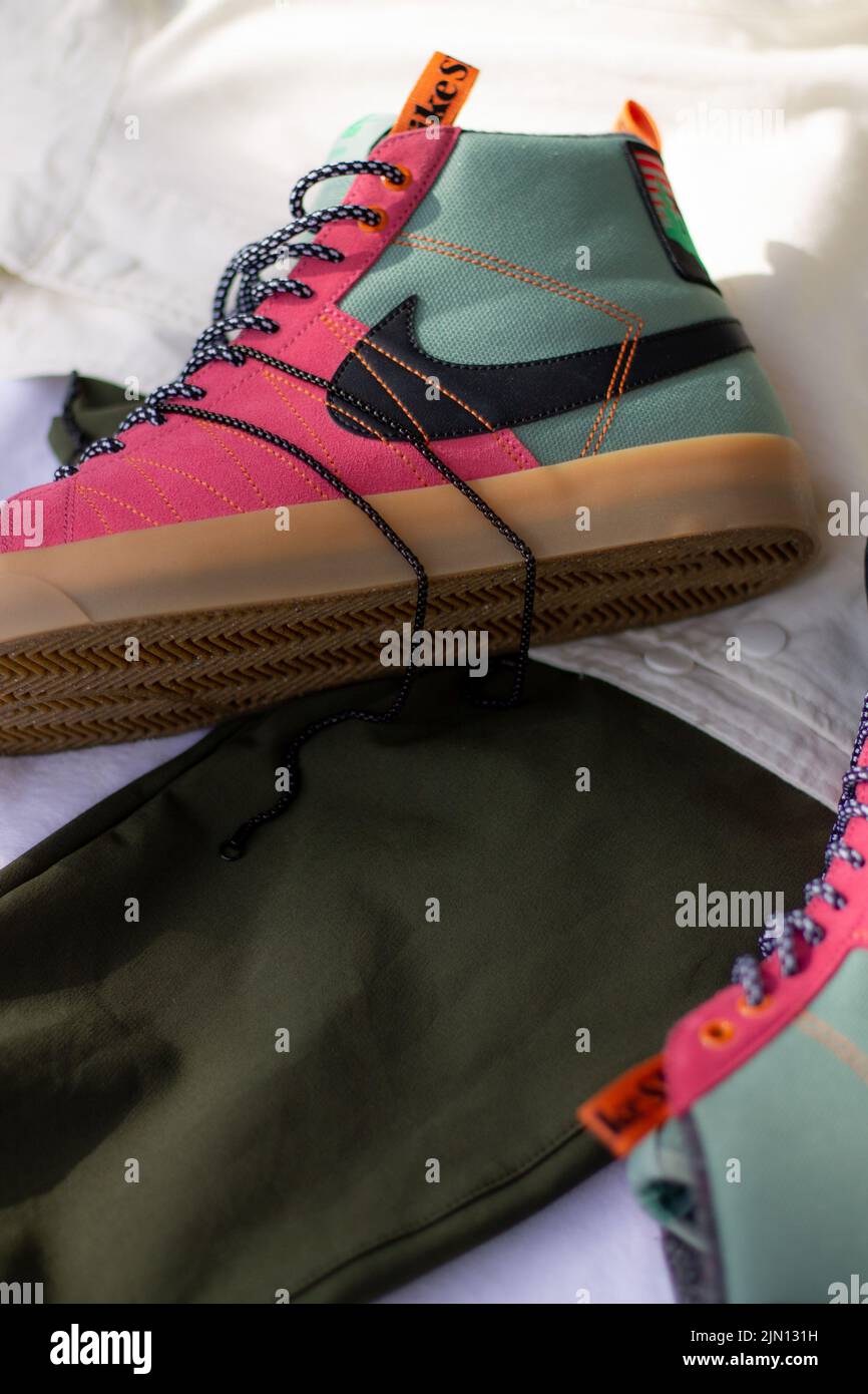 A close-up shot of sneakers with decorations: product display ...