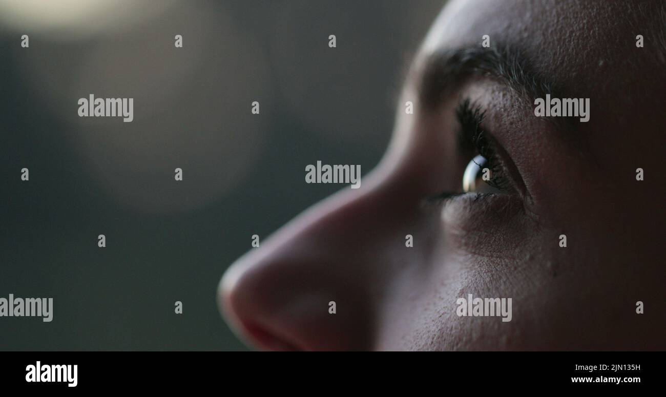 Girl meditating and in contemplation looking up to the sky with hope ...