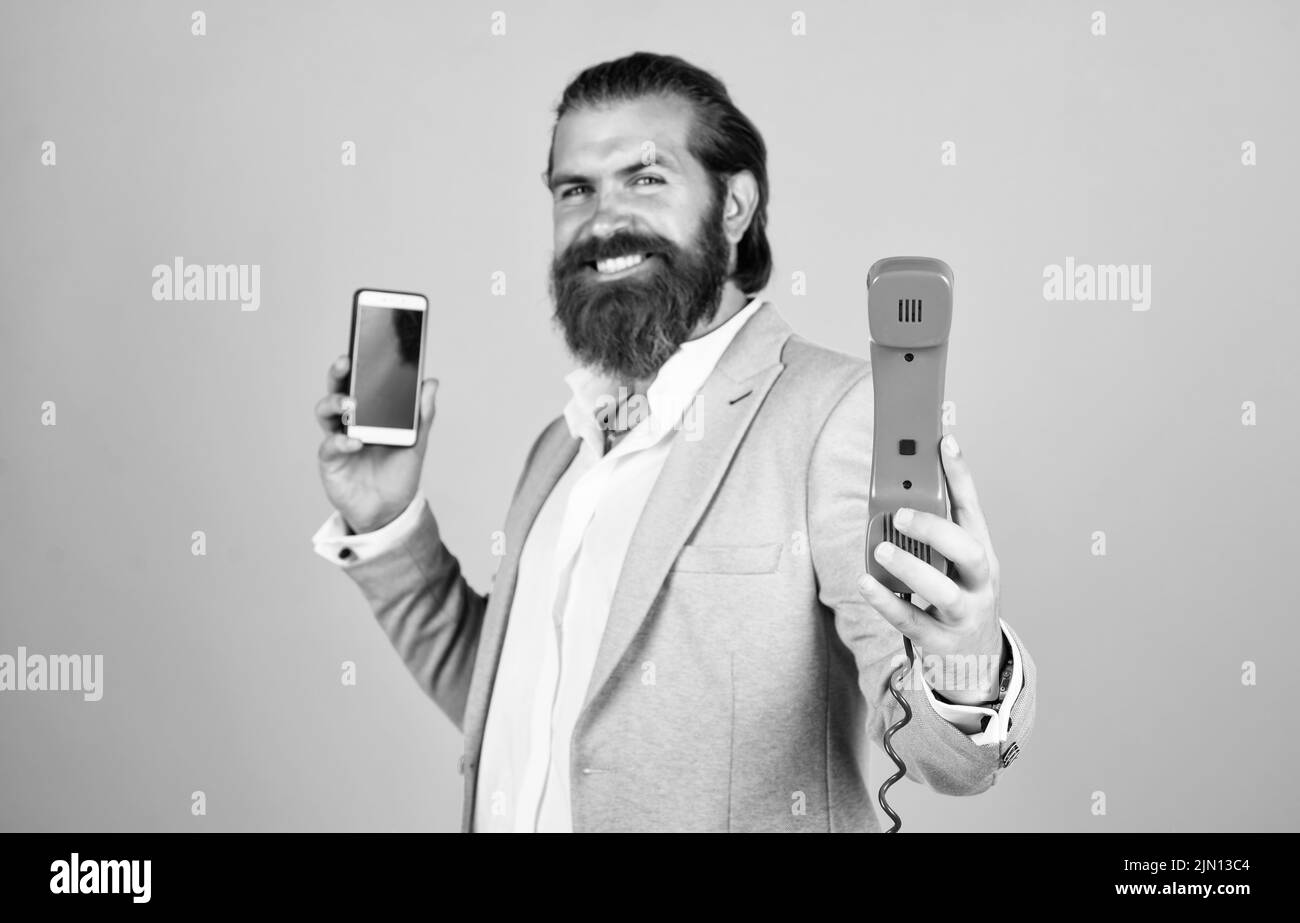 communication. true gentleman with groomed hair hold vintage telephone ...